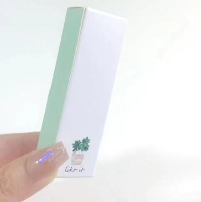 China Square Cosmetic Packaging Carton Stock Green Plant Lipstick Lip Gloss Packaging Foldable Carton Liquid Lip Gloss for sale