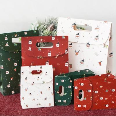 Cina Sacchetti regalo in carta con manici per caramelle e piccoli regali di Natale in vendita