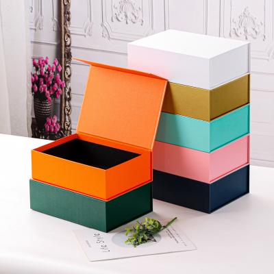 China Caja de regalo magnética de color puro, caja de embalaje, regalo de cumpleaños, regalo de reunión anual de negocios en venta