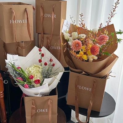 China Umweltfreundliche Kraftpapier-Handtaschen für Blumensträuße, Obst und Gebäck zu verkaufen