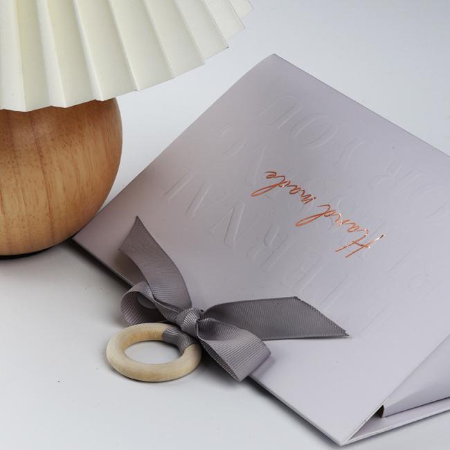 Multi-color gift box with wooden ring handles