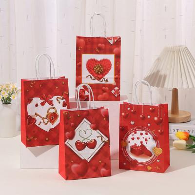China Various Styles Of Customized Kraft Paper Gift Bags Red Love Gift Bags Valentine'S Day Gift Packaging Bags for sale