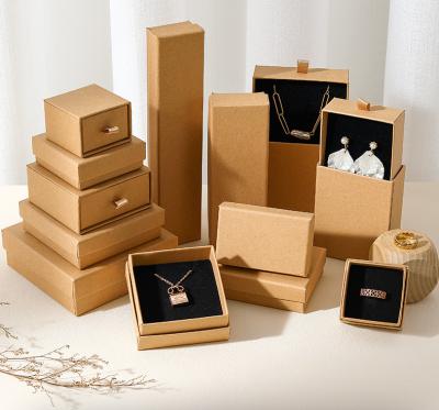Cina Set di scatole per gioielli personalizzate in carta kraft con cassetti organizzatori in vendita