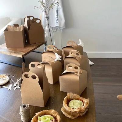 China Custom Kraft Paper Basque Cake Box with Twisted Handle for sale