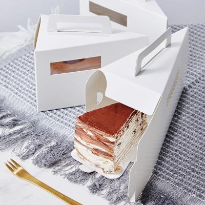 China Custom Kraft Paper Triangular Cake Slice Box with Twisted Handle for sale