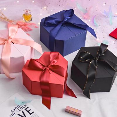 China Luxury Octagonal Gift Box Set Premium Hexagonal Packaging Satin Ribbon Bows Cosmetic Gift Ready for sale