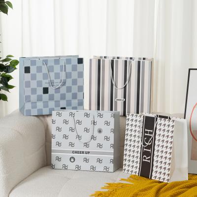 China Larger Gift Bag Handbag Universal Handbag Gift Bag Packaging Paper Bag Gift Packaging Bag for sale