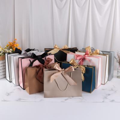 중국 보크노트 종이 쇼핑 가방 화장품 다채로운 선물 가방 포장 의류 쇼핑 가방 로고 인쇄 판매용