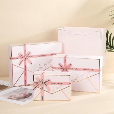 China New Exquisite Gift Box With Bow Creative Design For Holiday Clothing And Cosmetics Gift Packaging for sale