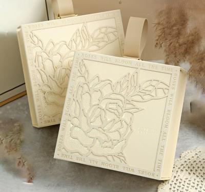 China Roses Will Bloom Engagement Candy Box Premium Wedding Favor Packaging Large Capacity Bridesmaid Gift Box Leather Handle for sale