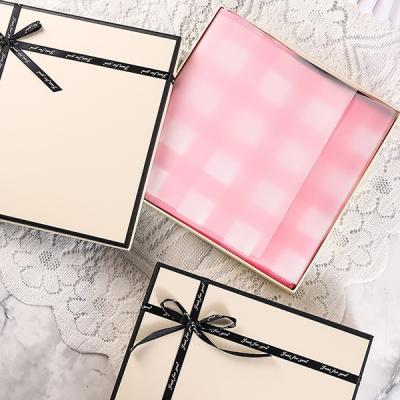 China Scarf Packaging Box Clothing Packaging Gift Box Top And Bottom Cover Beige Simple Gift Box for sale