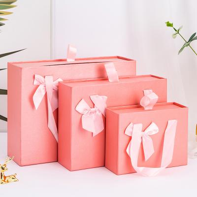 China Solid Color Bow-Tie Handbag Gift Box Package Drawer Box  customized Rectangular Souvenir Box for sale