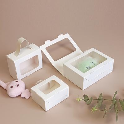 China Creative Windowed Hand-Held Gift Box Birthday And Holiday Cookie And Candy Box Souvenir Packaging for sale