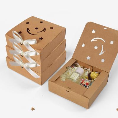 China Simple Hollowed-Out Square Star And Moon White Bow Gift Box Flip-Top Folding Square Gift Box for sale