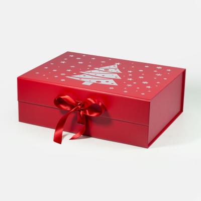 China Custom Magnetic Flip Top Christmas Gift Boxes Foldable Holiday Packaging with Snowflake Tree Designs for sale