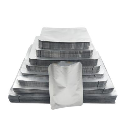 Cina Silver Heat Seal Three Layers Laminated Airtight Mylar Vacuum Aluminum Foil Vacuum Bags in vendita