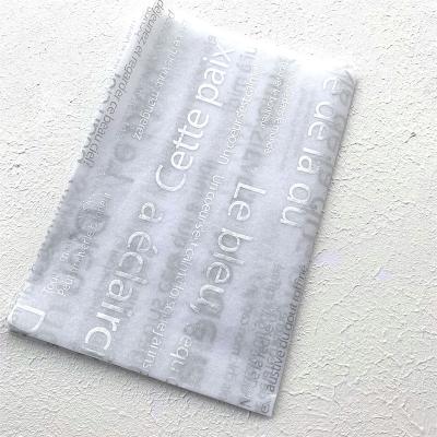 China Customized Thin White Tissue Paper With Glossy Glitter Silver Logo Printing for sale