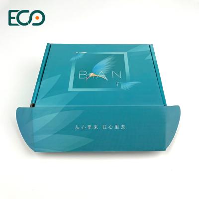 China Turquoise Printed Mailer Shipping Carton Box Custom Logo Corrugated Paper Clothing Shipping Box With Tissue Paper Wrap for sale