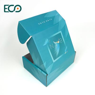 China Turquoise Printed Mailer Shipping Carton Box Custom Logo Corrugated Paper Clothing Shipping Box With Tissue Paper Wrap for sale