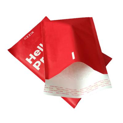 Cina Custom Logo A4 Red Kraft Paper Bubble Mailer For Cosmetic Packaging in vendita
