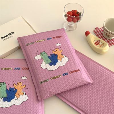 Cina Custom Printed Cartoon Design Purple Poly Bubble Mailers Mailing Bags For Clothing And Books in vendita