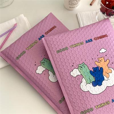 Cina Custom Printed Cartoon Design Purple Poly Bubble Mailers Mailing Bags For Clothing And Books in vendita