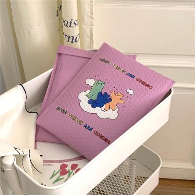 Cina Custom Printed Cartoon Design Purple Poly Bubble Mailers Mailing Bags For Clothing And Books in vendita