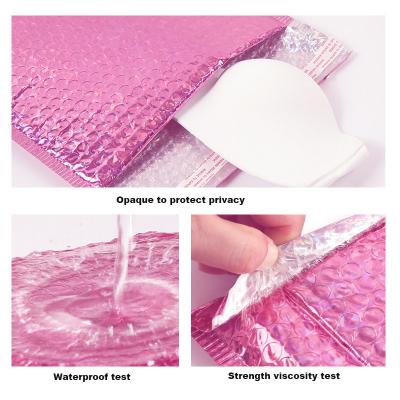 Cina Rose Red Custom Size Logo Printing Waterproof Pink Bubble Mailers Holographic Metallic Polymailers in vendita