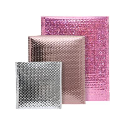 Cina Multicolor Mini Bubble Mailer 4x8 Rose Red Metallic Holographic Laser Bubble Mailers for Cosmetic Packaging in vendita