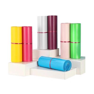 Cina Low Moq Simple White Plastic Courier Mailing Bag Book Cloth Packing Mail Bags For Shipping in vendita