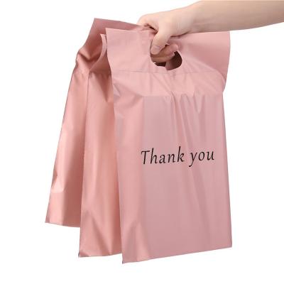 Cina Pink Poly Mailing Bag For Clothing Shipping Courier Packaging With Handles in vendita