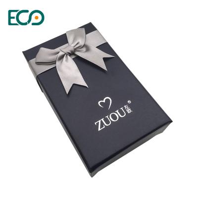 China Custom Black And Silver Foil Logo Lid And Base Gift Packaging Paper Rigid Box With Cream Bow Ribbon for sale