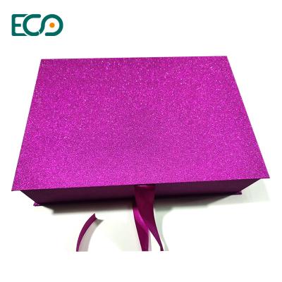 China Ready To Ship Regular Size Decorative Glittering Gold Finishing Luxury Square Gift Box With Ribbon And Magnetic Lid for sale
