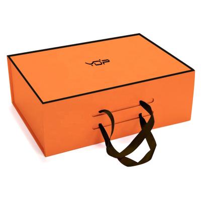 Cina Ready To Ship Orange Large Magnetic Rigid Box For Gift Packaging With Ribbon Handle in vendita