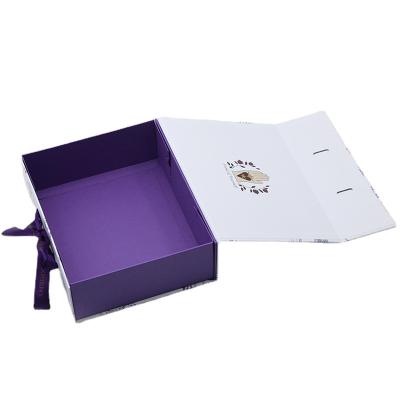 China Luxury Purple Cosmetic Folding Corrugated Box Collapsible Magnetic Rigid Box With Ribbon Te koop