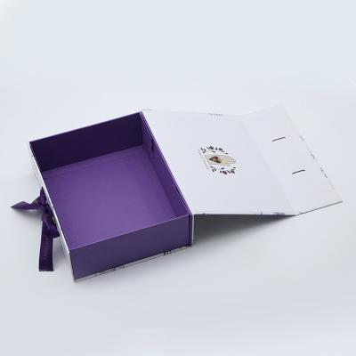China Luxury Purple Cosmetic Folding Corrugated Box Collapsible Magnetic Rigid Box With Ribbon Te koop