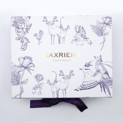 China Luxury Purple Cosmetic Folding Corrugated Box Collapsible Magnetic Rigid Box With Ribbon Te koop