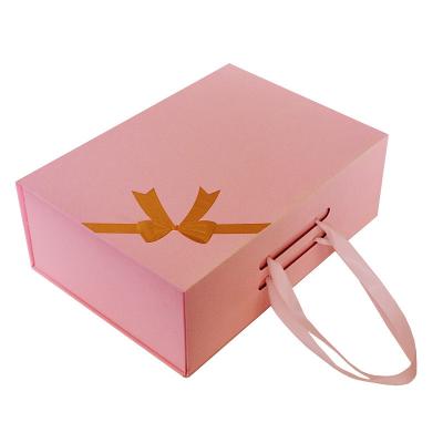 Cina Pink Folding Rigid Gift Box Cosmetic Paper Packaging Corrugated Cardboard Christmas Paper Box in vendita