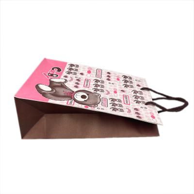China Decorative Cute Cartoon Pattern Kraft Paper Bag Pink Gift Shopping Paper Bag For Shoes Te koop