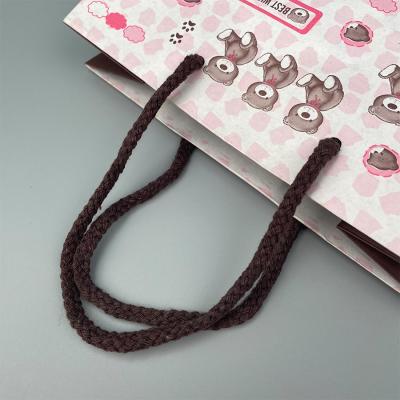 China Decorative Cute Cartoon Pattern Kraft Paper Bag Pink Gift Shopping Paper Bag For Shoes Te koop
