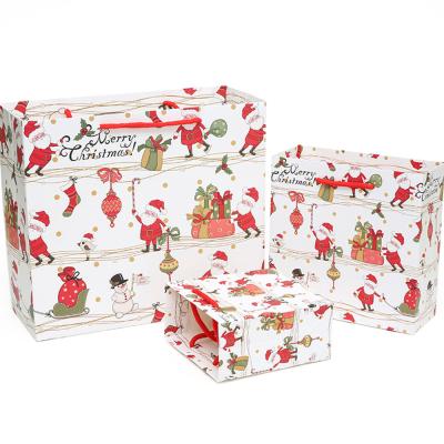 Cina Printed Gift Packing Paper Bag Green Fancy Boutique Ribbon Christmas Shopping Paper Bag in vendita