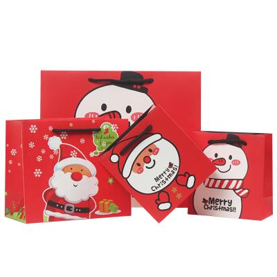 Cina Printed Gift Packing Paper Bag Green Fancy Boutique Ribbon Christmas Shopping Paper Bag in vendita