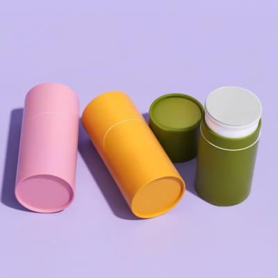 China Customized eco-friendly twist-up paper lip balm tubes, press-type lip balm tubes for sale