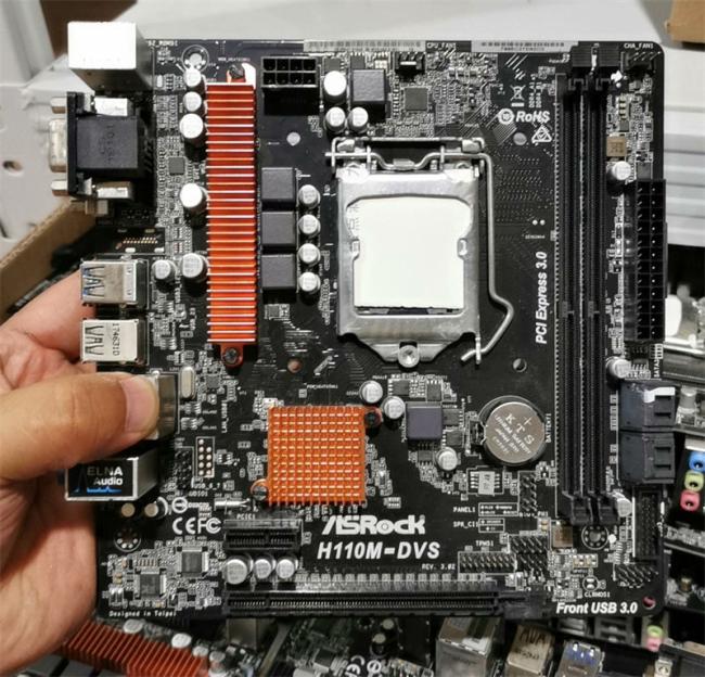 Side view of H110M motherboard showing ports