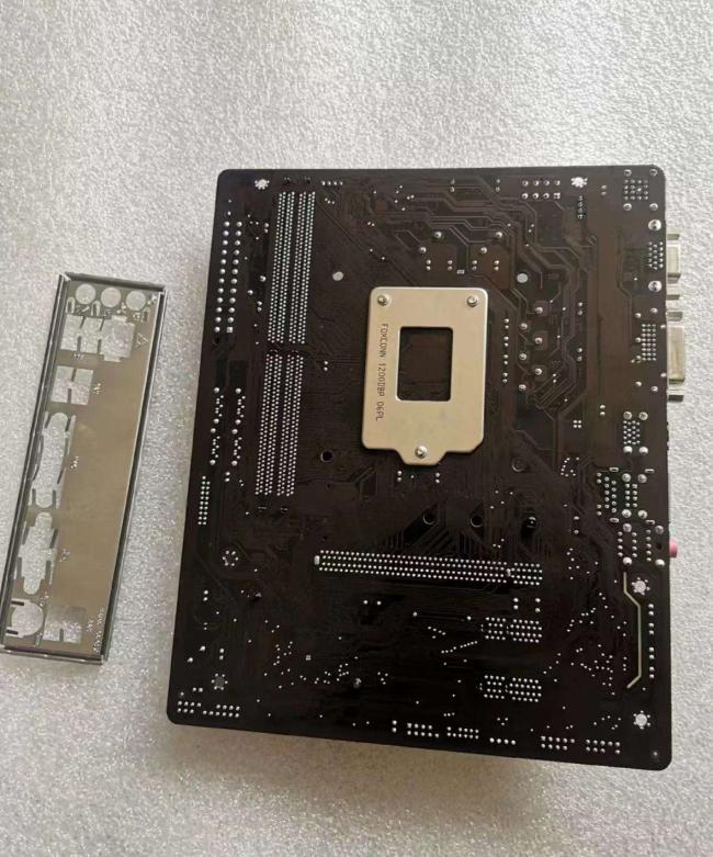 Intel H410M DS2V motherboard side view showing ports