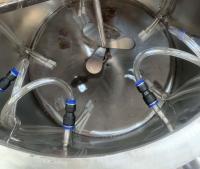 China Round Calf Milk Feeder Automatic Mixing Heated for sale