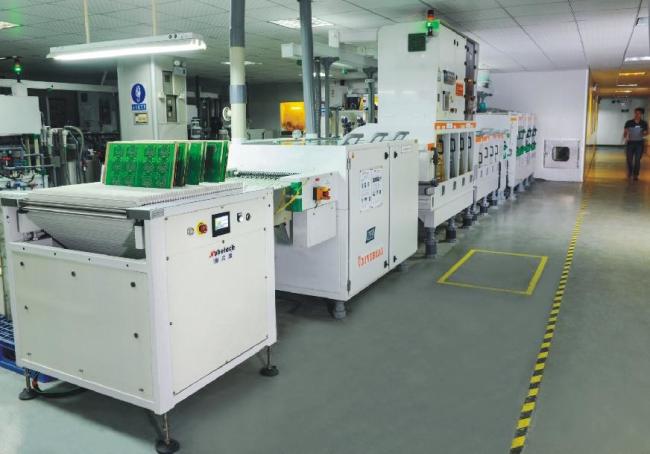 Finished RO4350B PCB assembly showing complete board with components