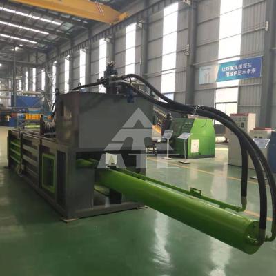 China Aluminium blikkenbaler 100 ton hydraulische persbaler horizontale kartonbaler machine Te koop