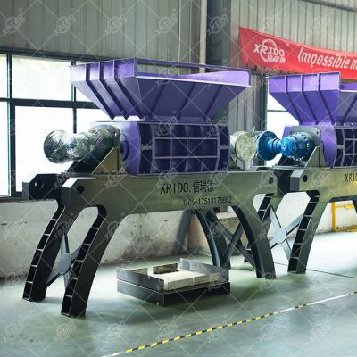 China Xrido Double Shaft Waste Plastic Shredder 300-22000 Kg/hour Capacity for sale