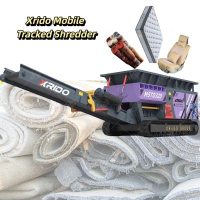 China Double Shaft Design 55 kW Power Multifunctional Tracked Mobile Shredder for Waste Plastic and Household Waste for sale
